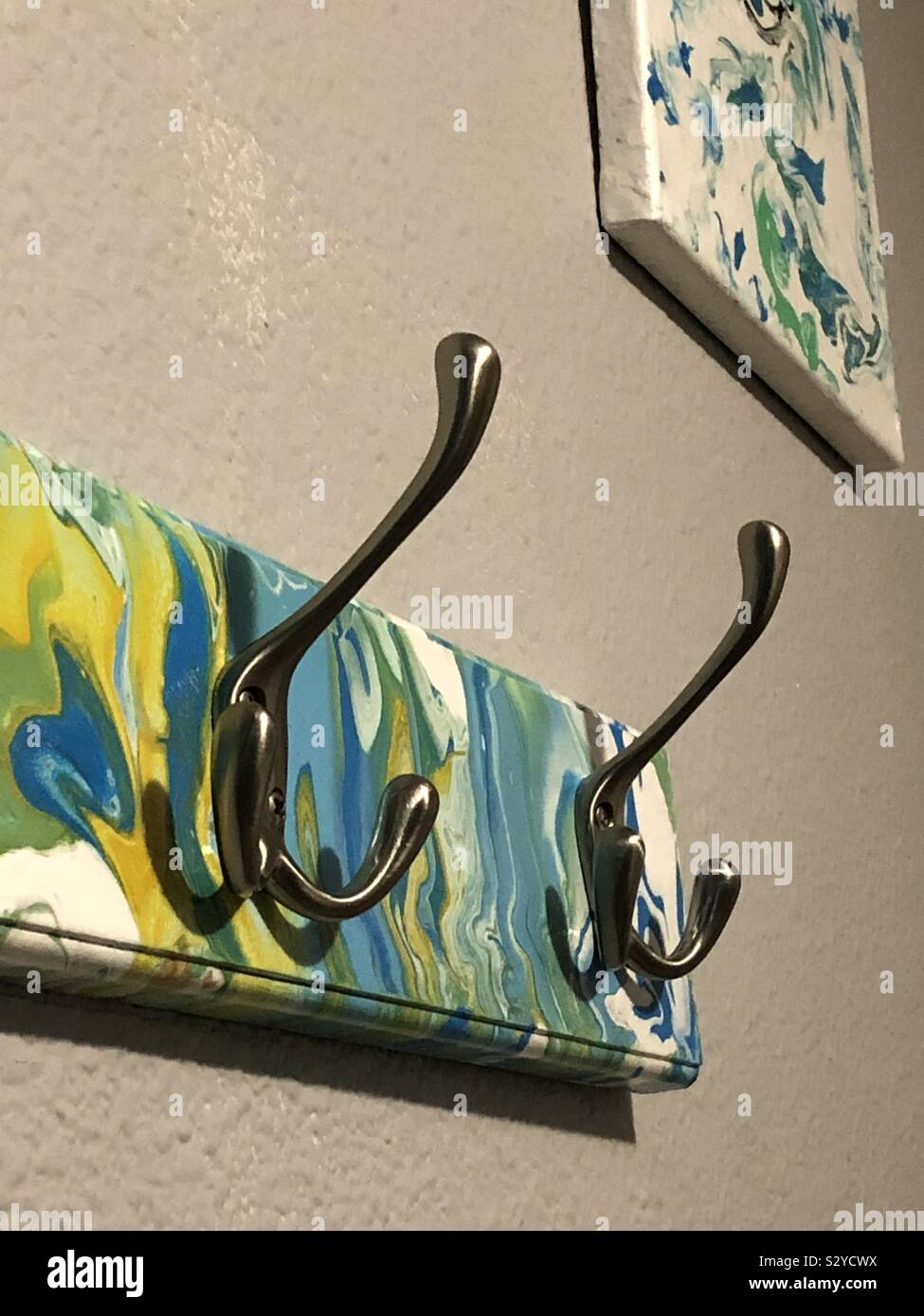 Abstract canvas with an abstract coat hanger Stock Photo - Alamy