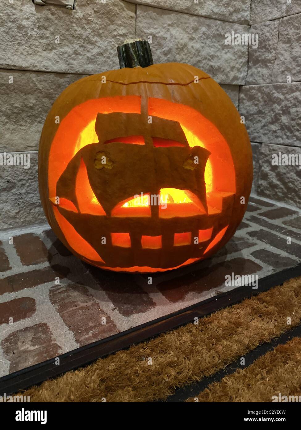 Pumpkin carved into a pirate boat for Halloween Stock Photo - Alamy