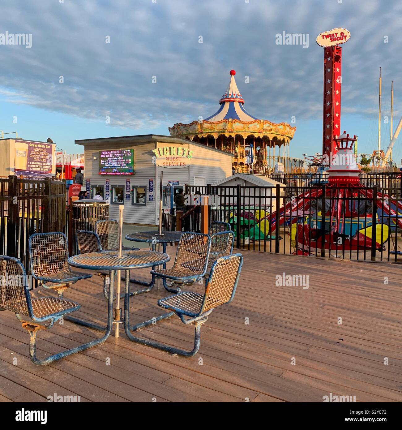 A table and seats at Steel Pier Amusement Park, Atlantic City Boardwalk ...