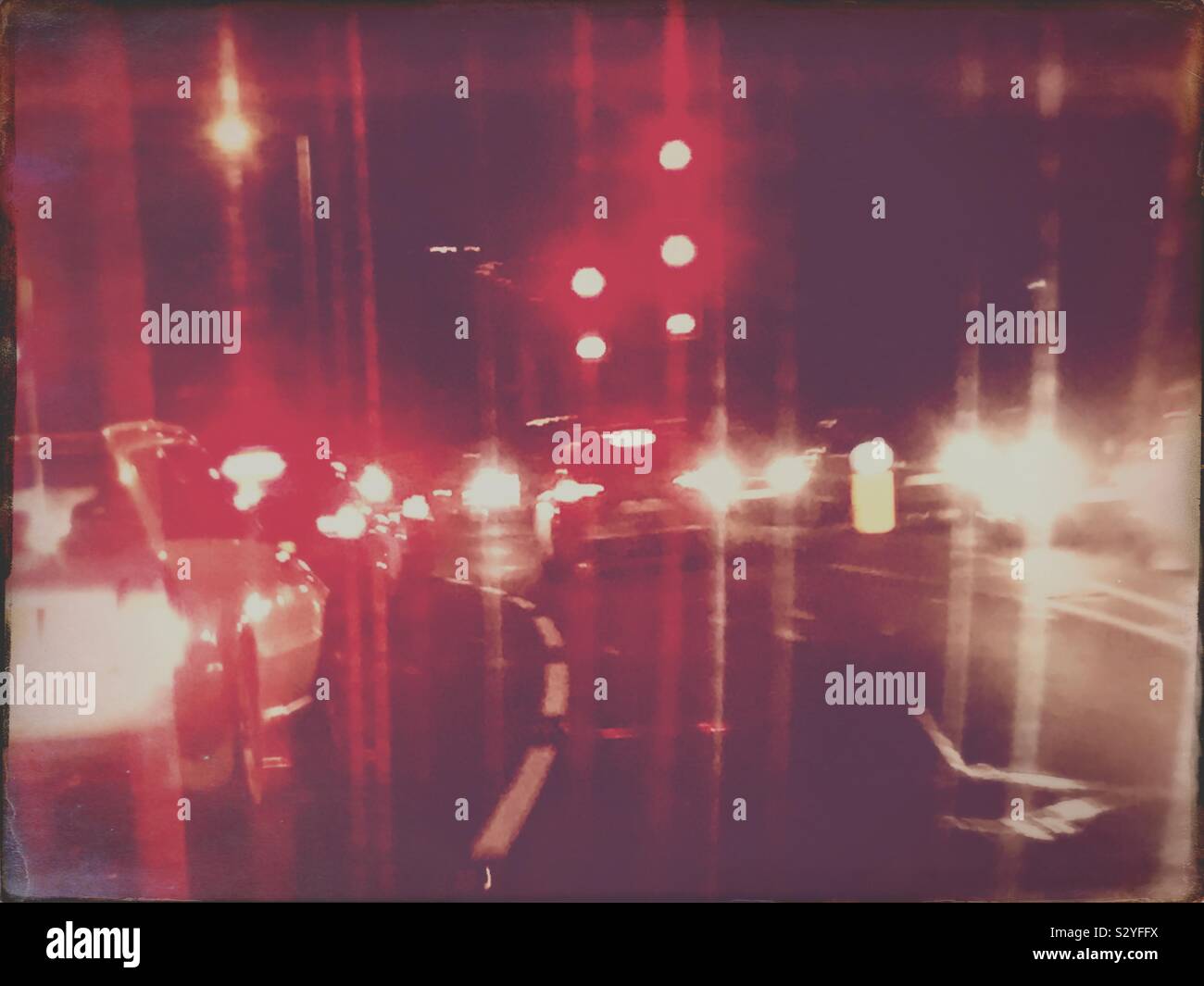 Cars on a busy road at night Stock Photo - Alamy