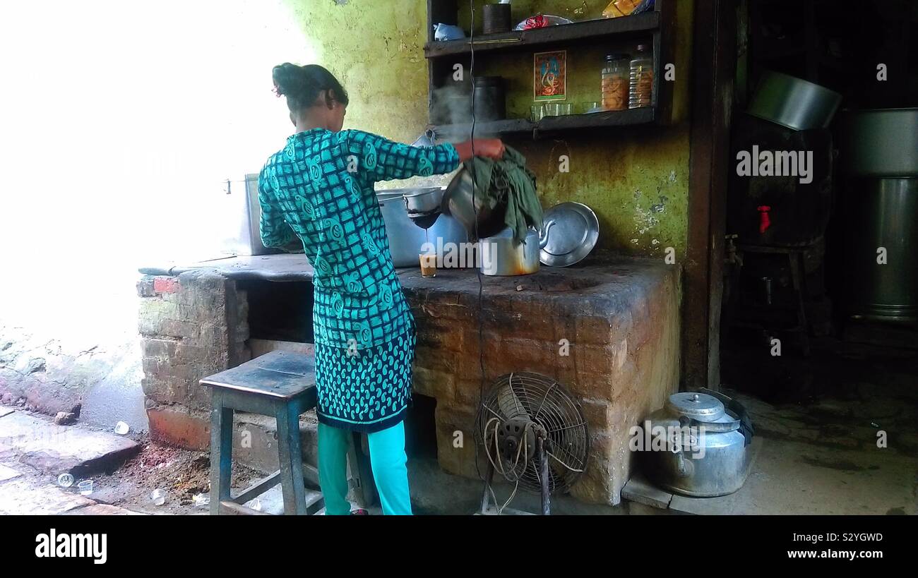 Time to get a chai again and this girl makes a grand one Stock Photo ...