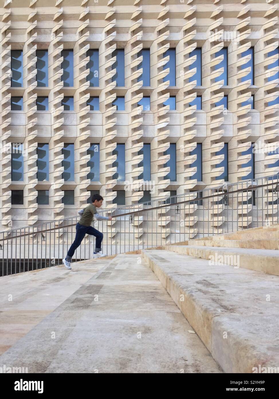 Boy in stairs hi-res stock photography and images - Alamy