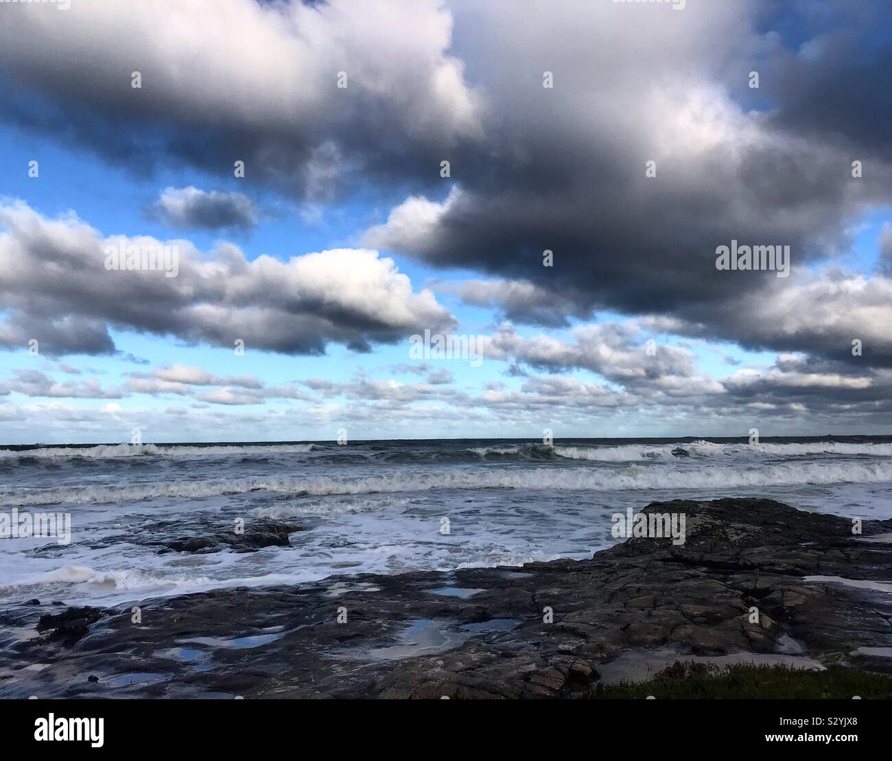 Rolling clouds over the sea Stock Photo - Alamy