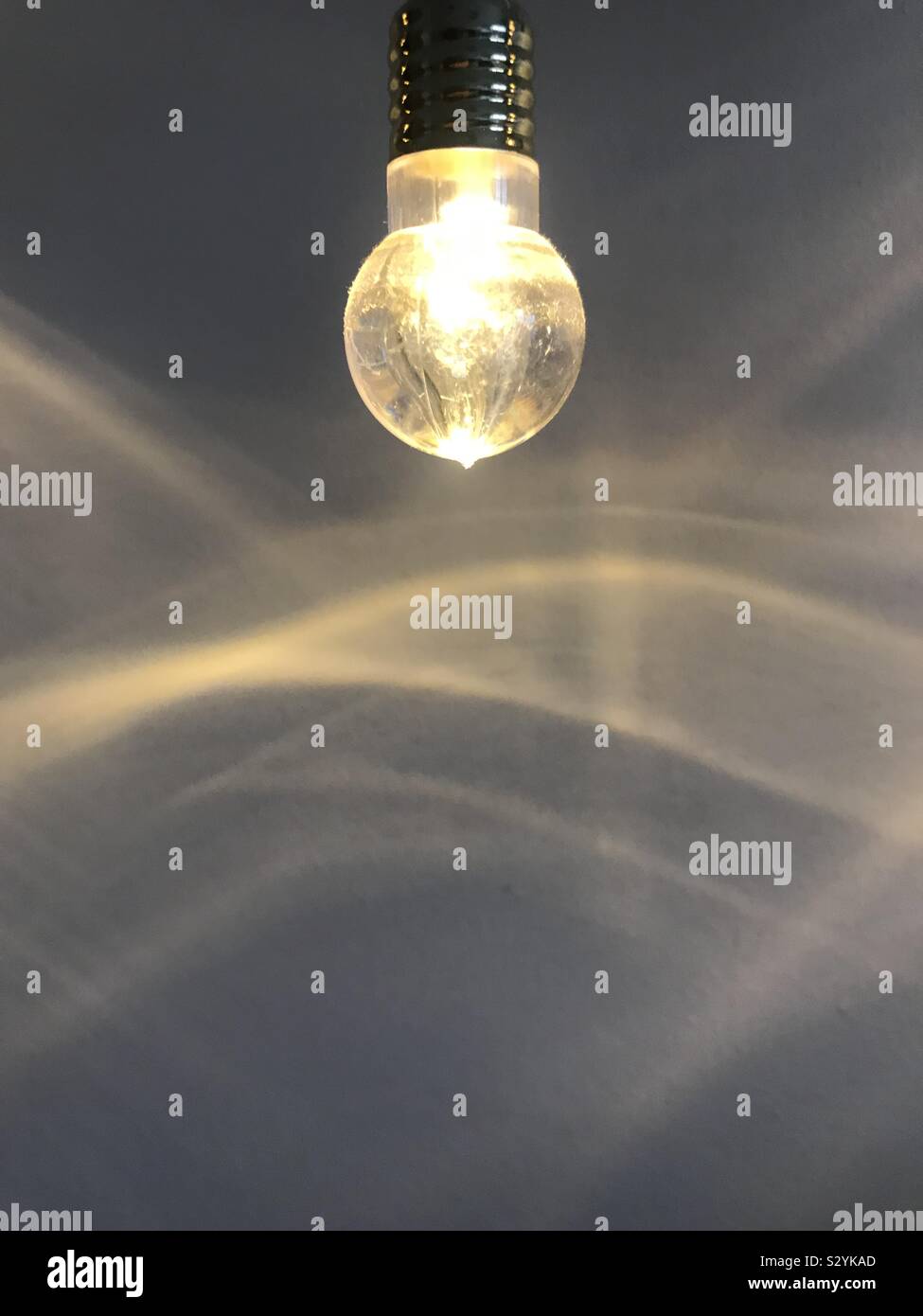 Lightbulb, white light Stock Photo - Alamy
