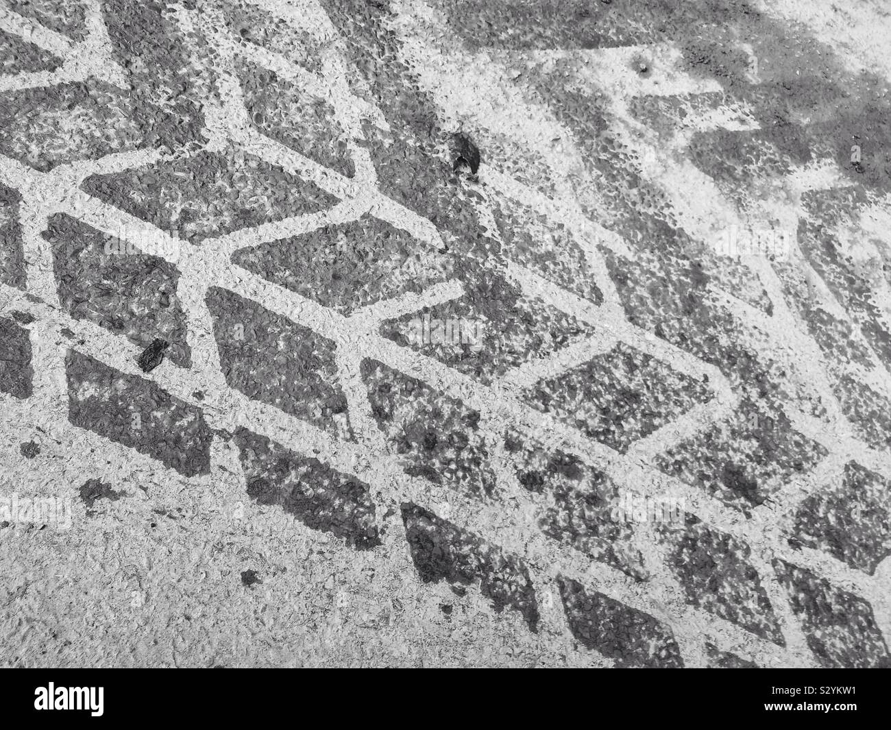 Grunge background of tyre track pattern on road surface Stock Photo - Alamy