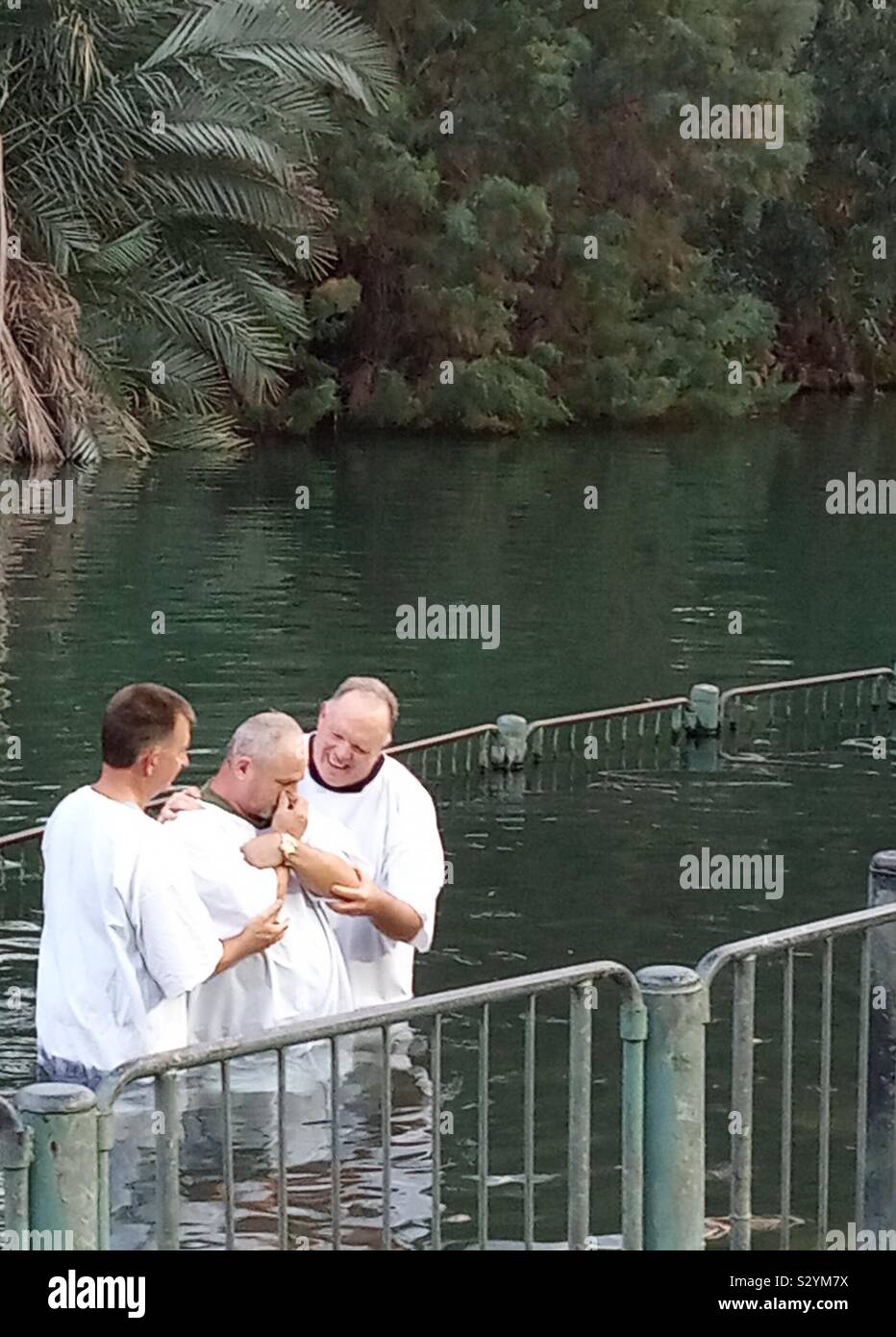 Baptism at the Jordan river in Israel Stock Photo - Alamy
