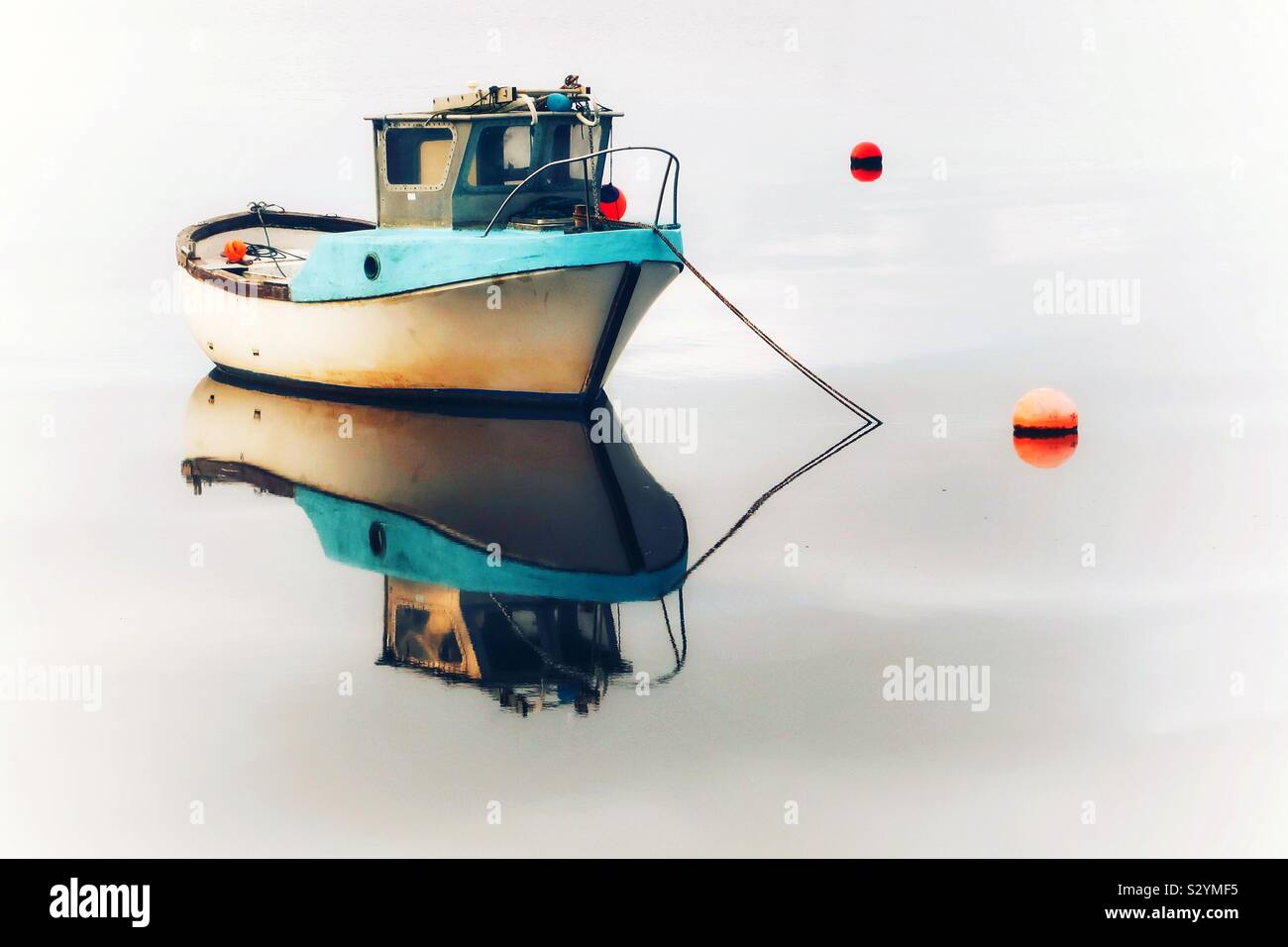 Small boat in calm waters, Irvine, Ayrshire, Scotland, UK Stock Photo ...