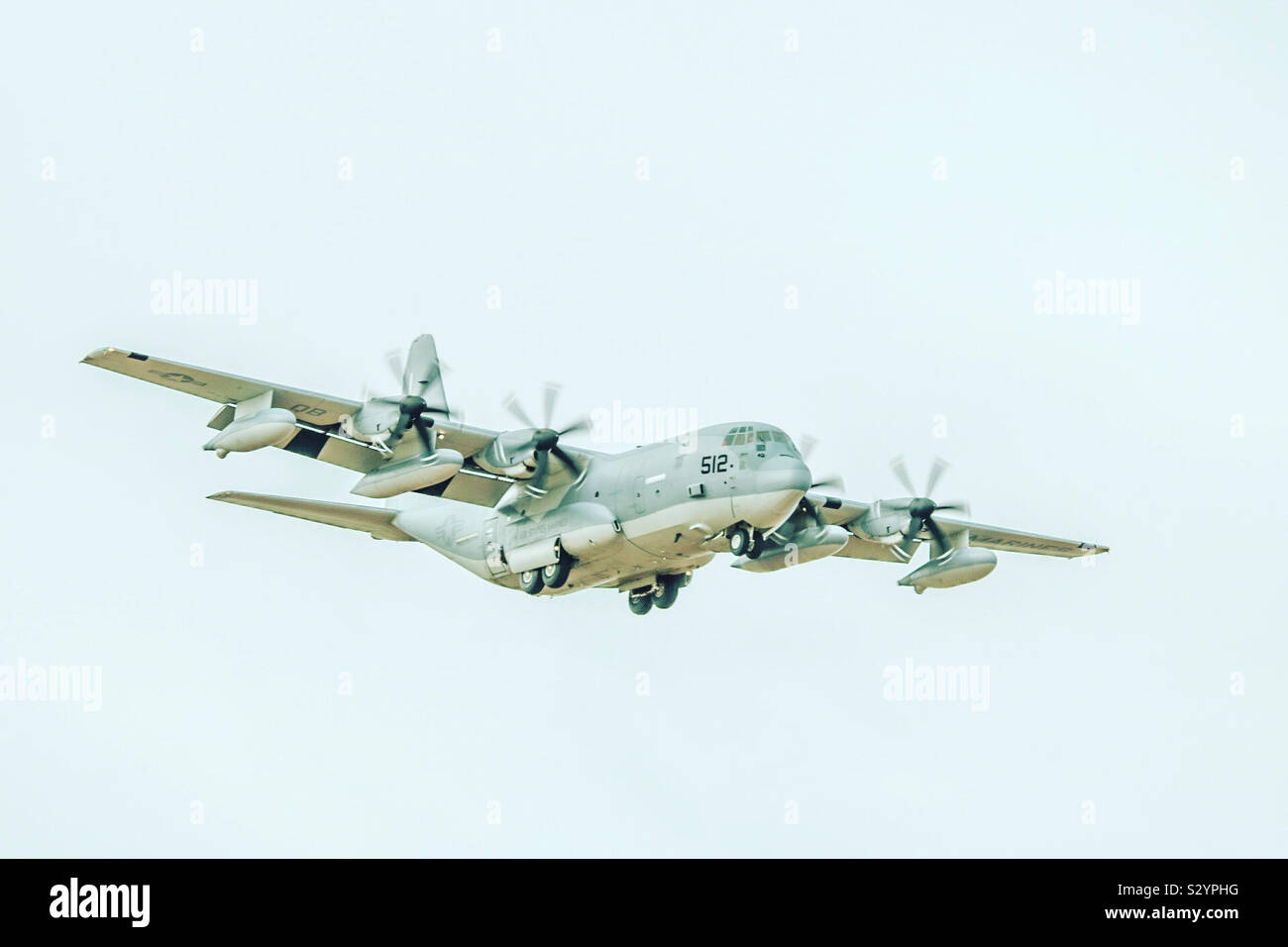Military Aircraft flying high Stock Photo - Alamy