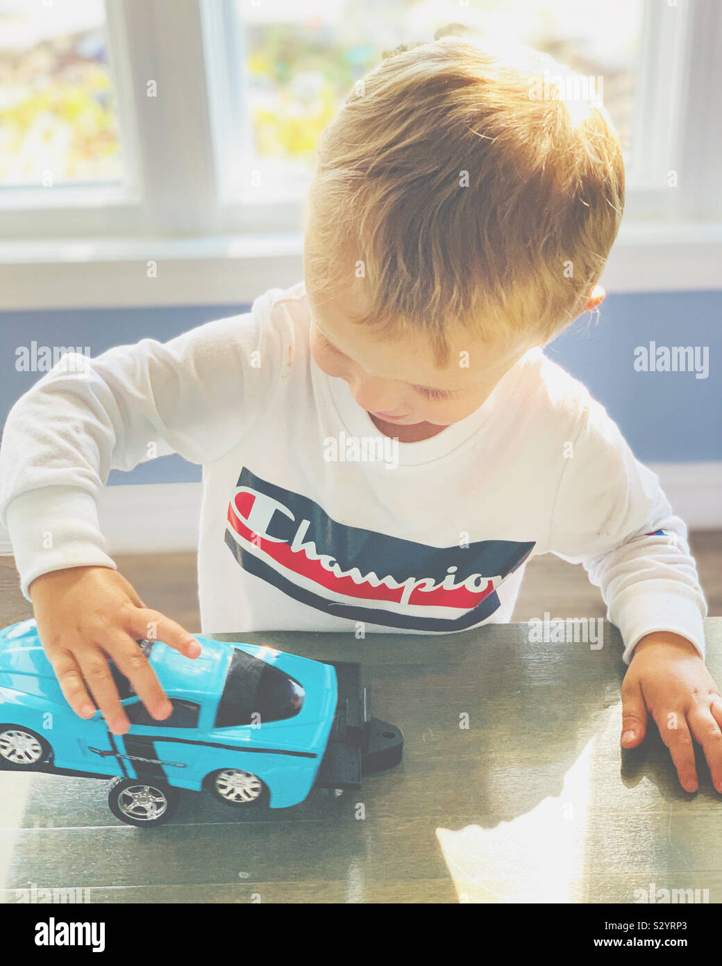 Boys and their toys Stock Photo - Alamy