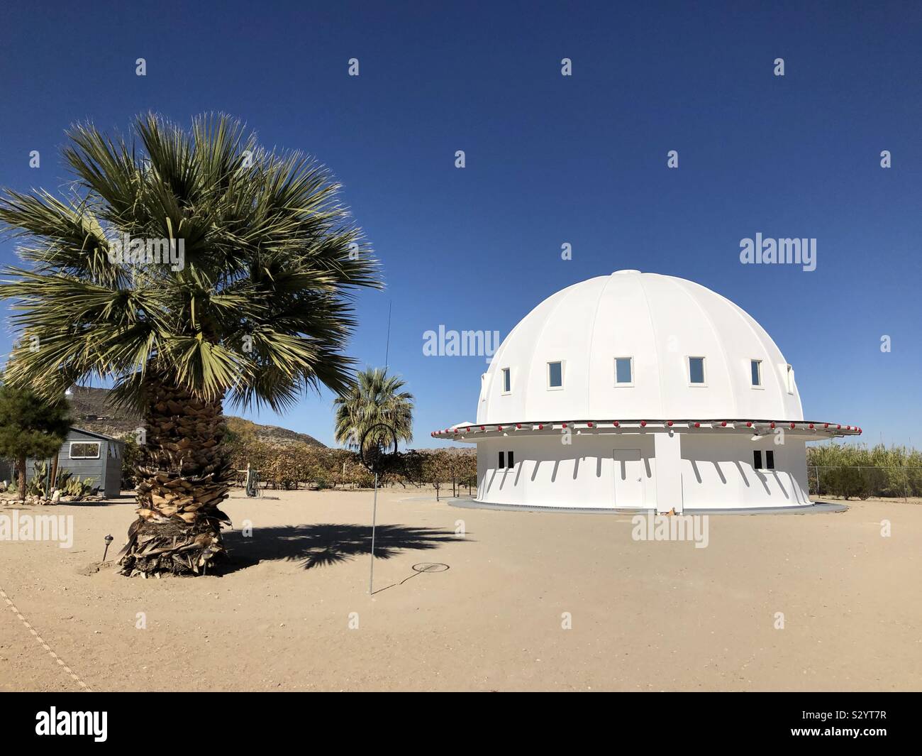 Integratron, Landers, California with palm tree Stock Photo - Alamy