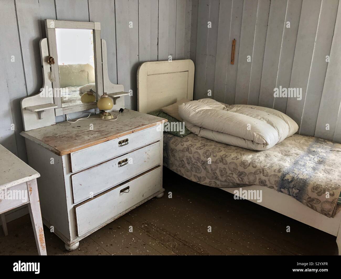 Bedroom interior in an old, abandoned farmhouse untouched for about ...