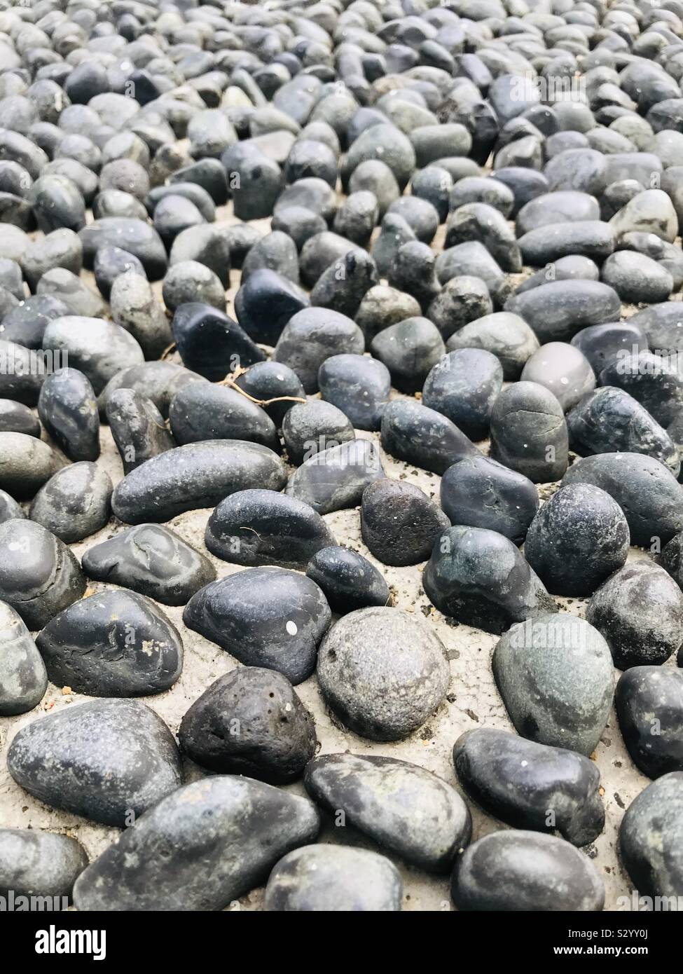 Feet massage pebbles hi-res stock photography and images - Alamy