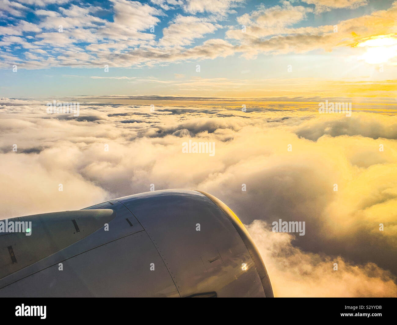 Ryanair Boeing 737-8AS in flight climbing above the clouds Stock Photo ...