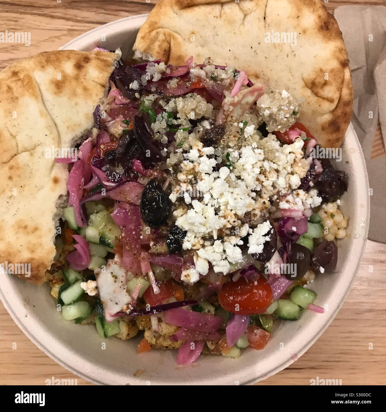 Greek Salad with Toasted Pita Stock Photo - Alamy