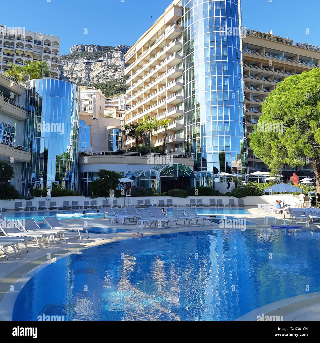 Swimming pool at luxury hotel in Monaco Stock Photo - Alamy