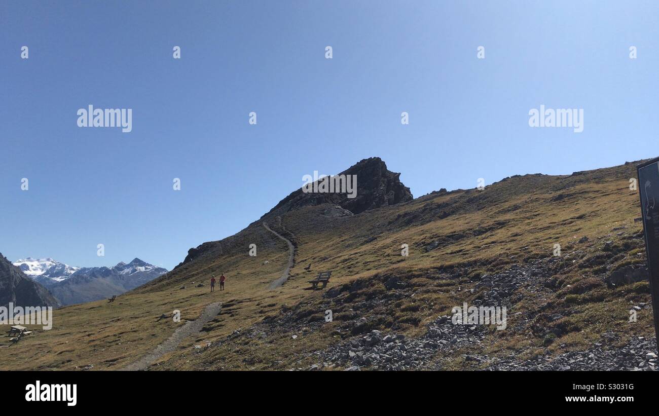 Italian alps path during summer Stock Photo - Alamy