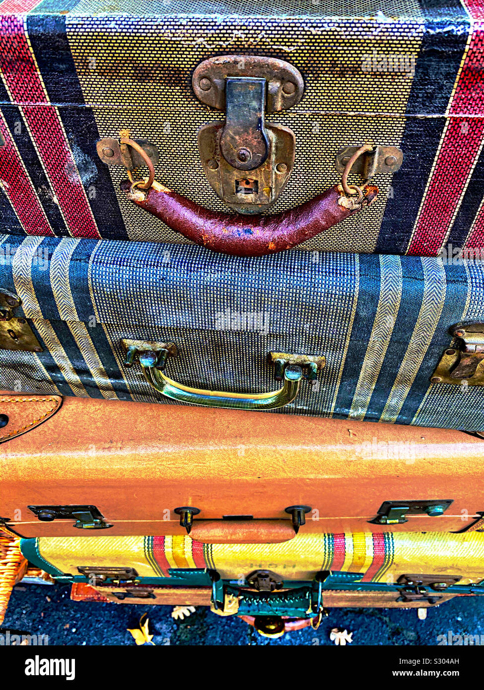 Four old suitcases Stock Photo - Alamy