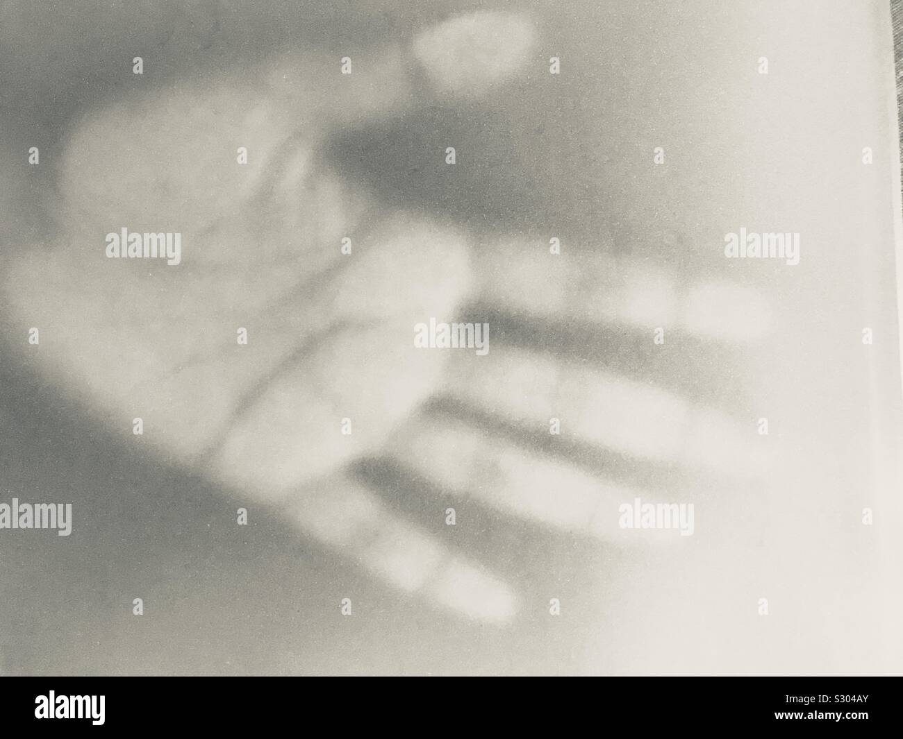 Black and white glass hand hi-res stock photography and images - Alamy