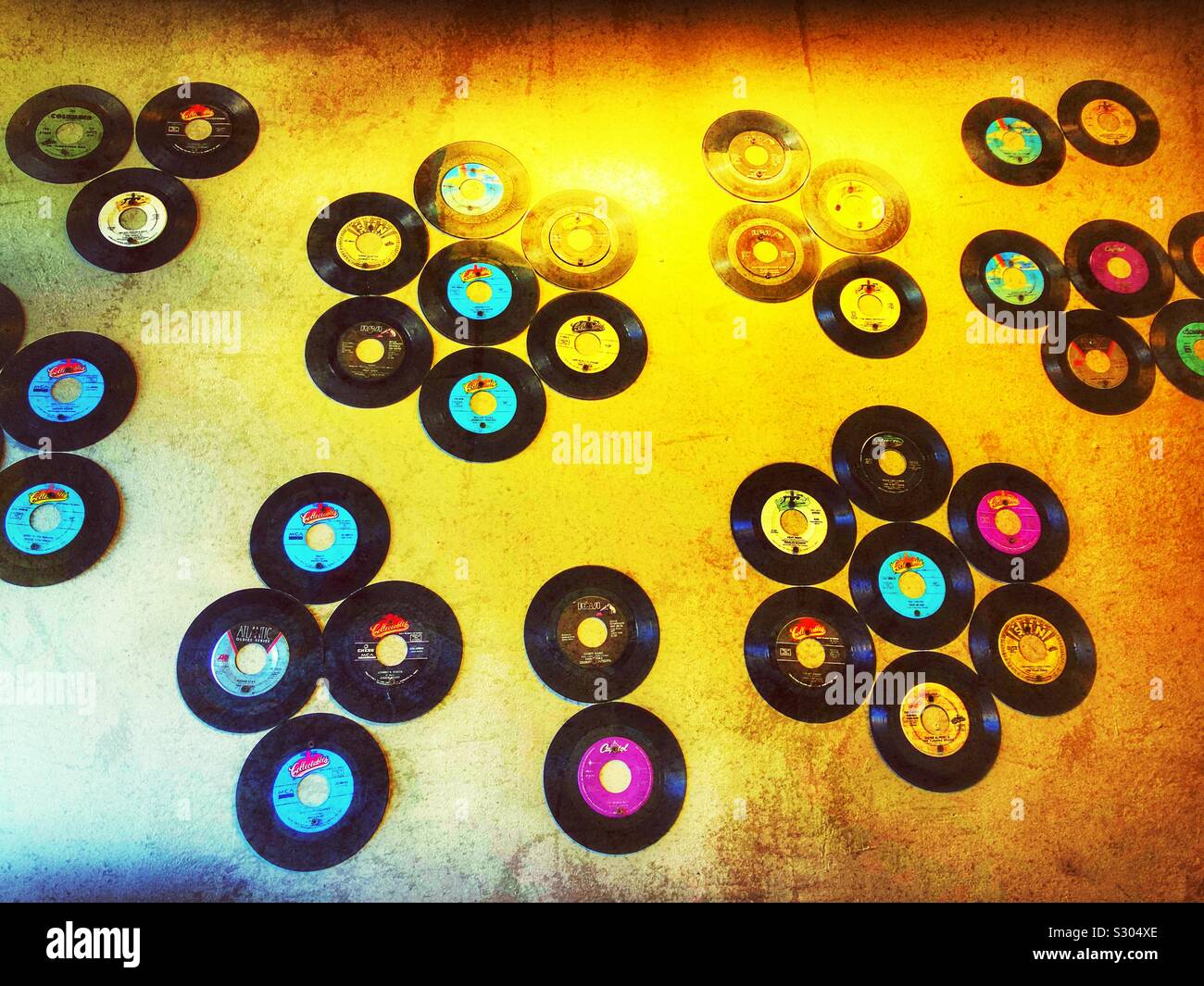 Vinyl 45 records display on a wall Stock Photo - Alamy