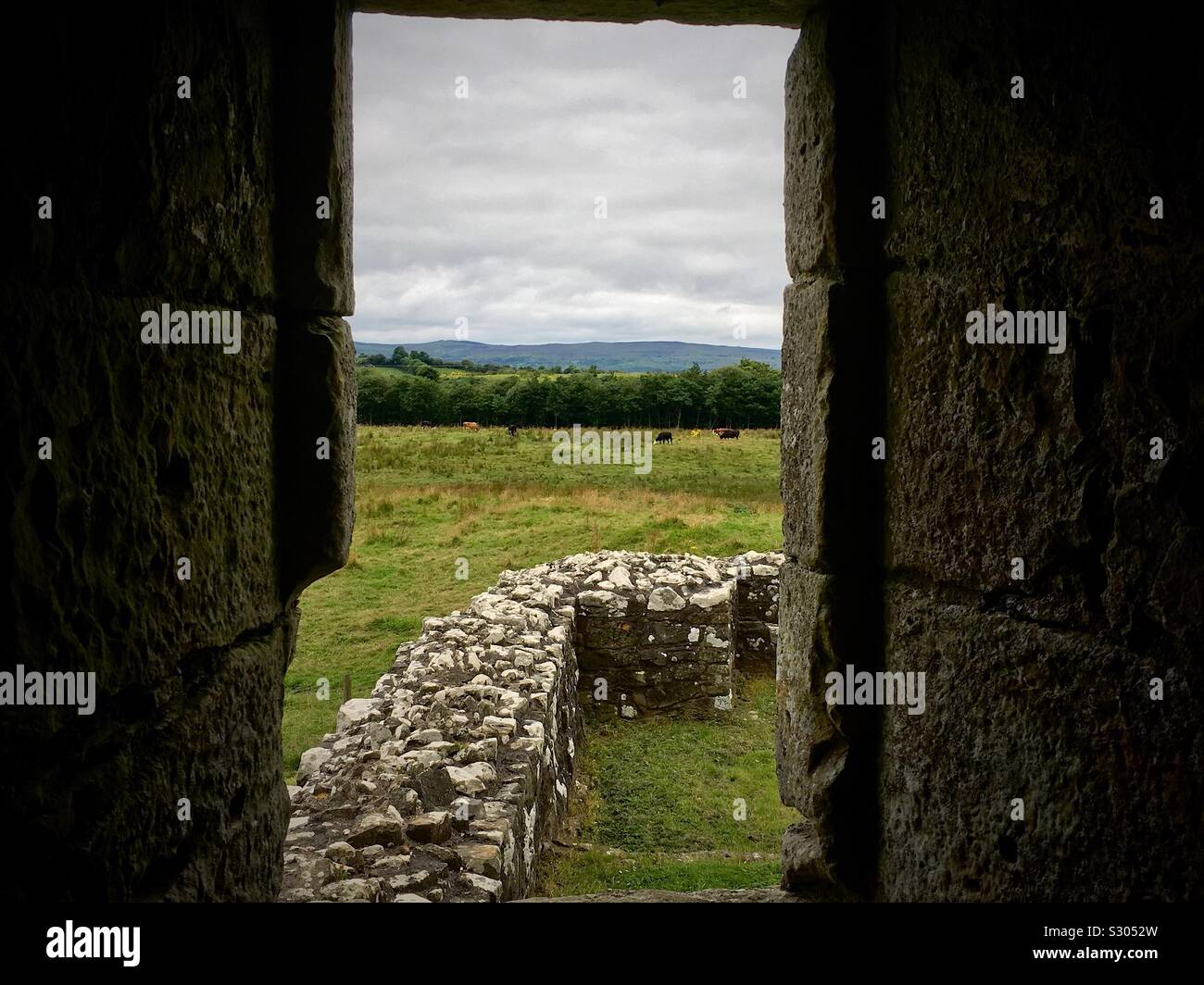 Inside looking out abandoned castle Stock Photo - Alamy