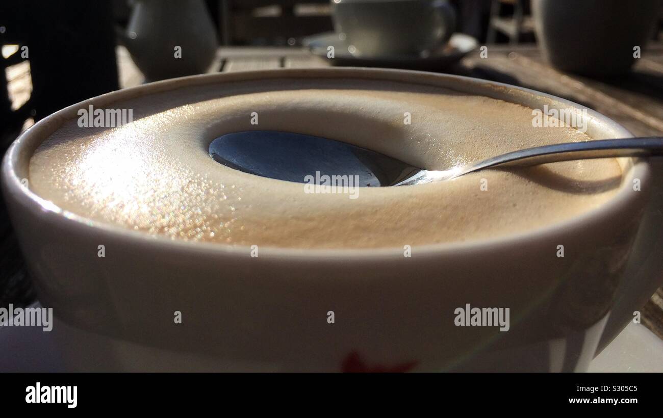 Spoon in coffee Stock Photo - Alamy