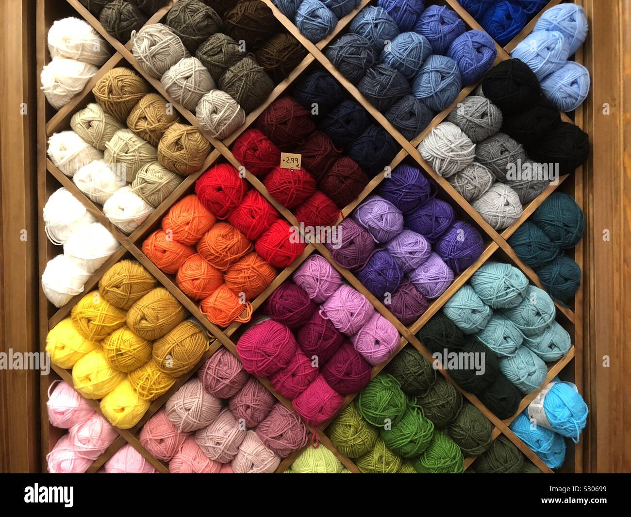 Balls of wool in a shop display Stock Photo - Alamy