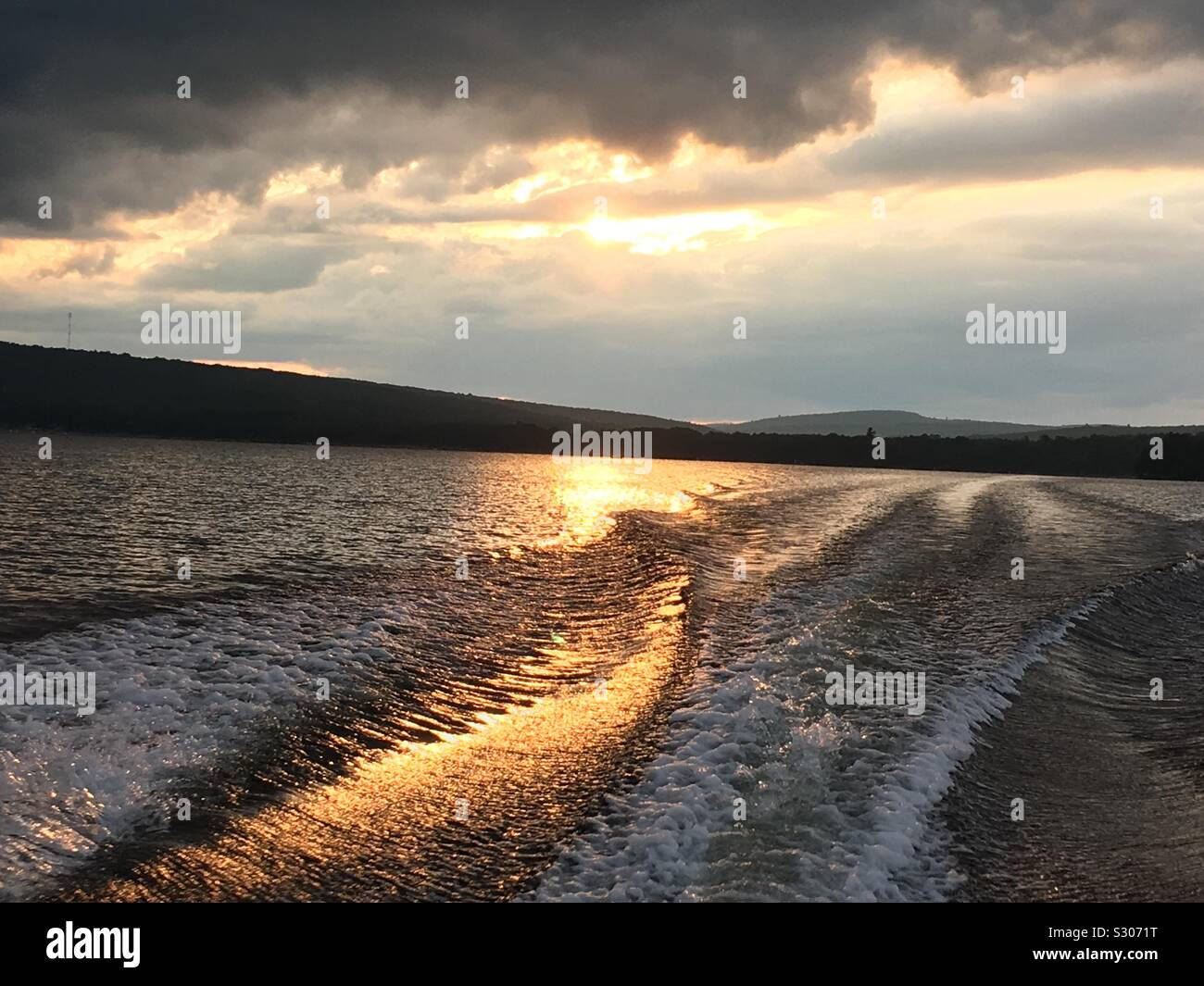Boat wake sunset hi-res stock photography and images - Alamy