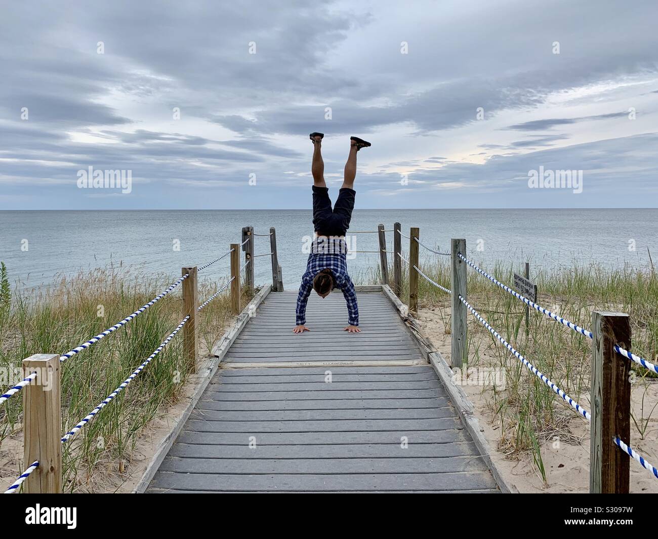 Handstand on beach hi-res stock photography and images - Alamy