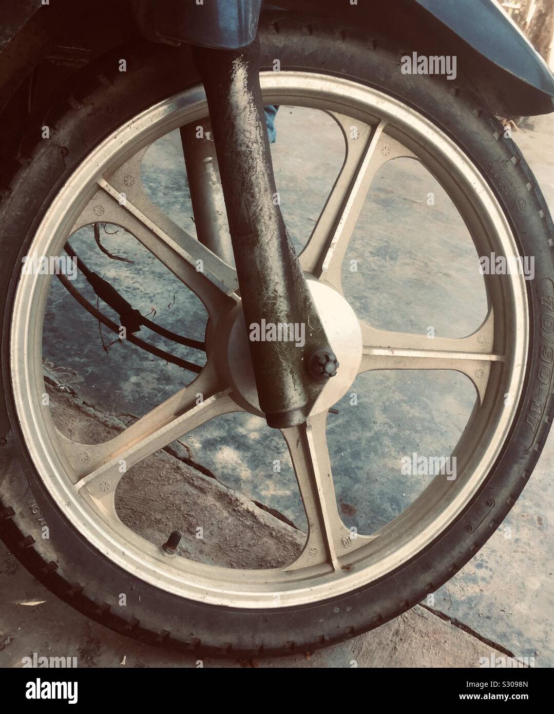 Old asian motorcycle rims Stock Photo - Alamy
