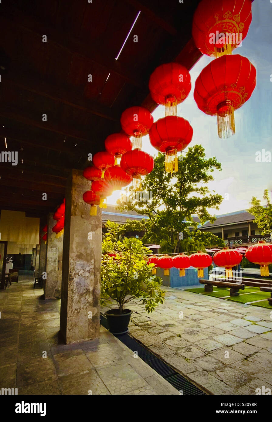 Chinese lanterns hanging outside a building Stock Photo - Alamy