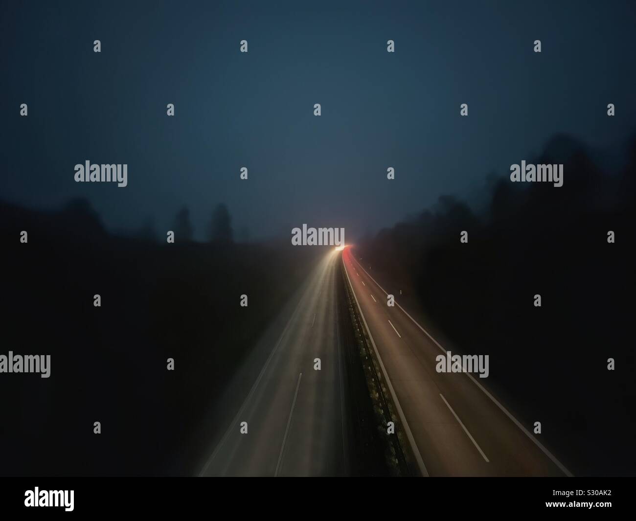 Traffic on the Autobahn in the night Stock Photo - Alamy