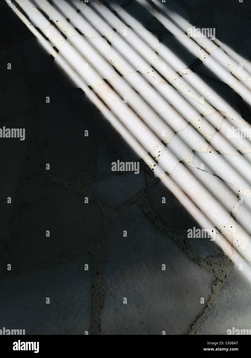 Sunlight through main door- shadow of door grill Stock Photo - Alamy