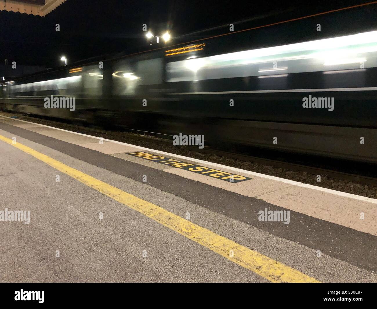 Stand behind yellow line hi-res stock photography and images - Alamy