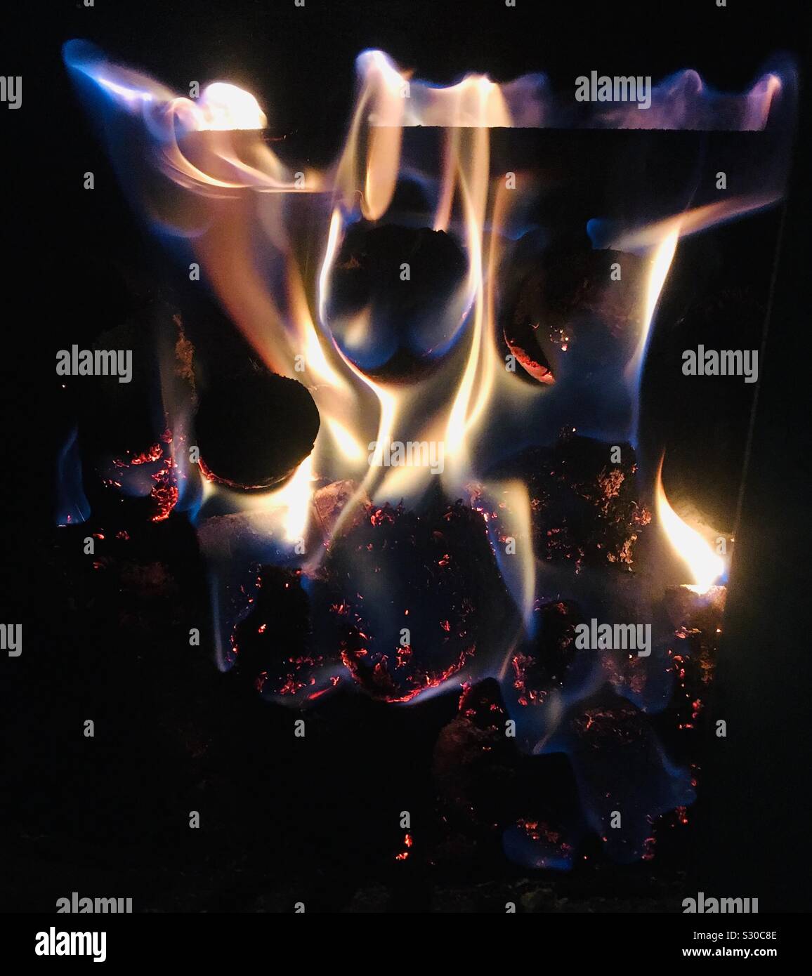 Coal fire flames in winter Stock Photo - Alamy