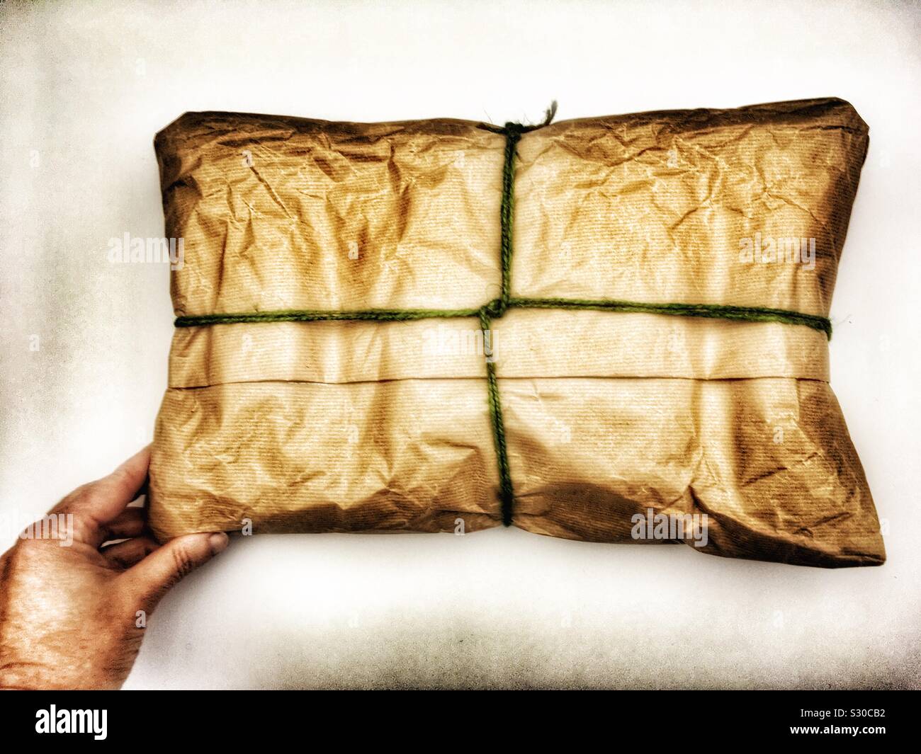 String wrapped parcels hi-res stock photography and images - Alamy