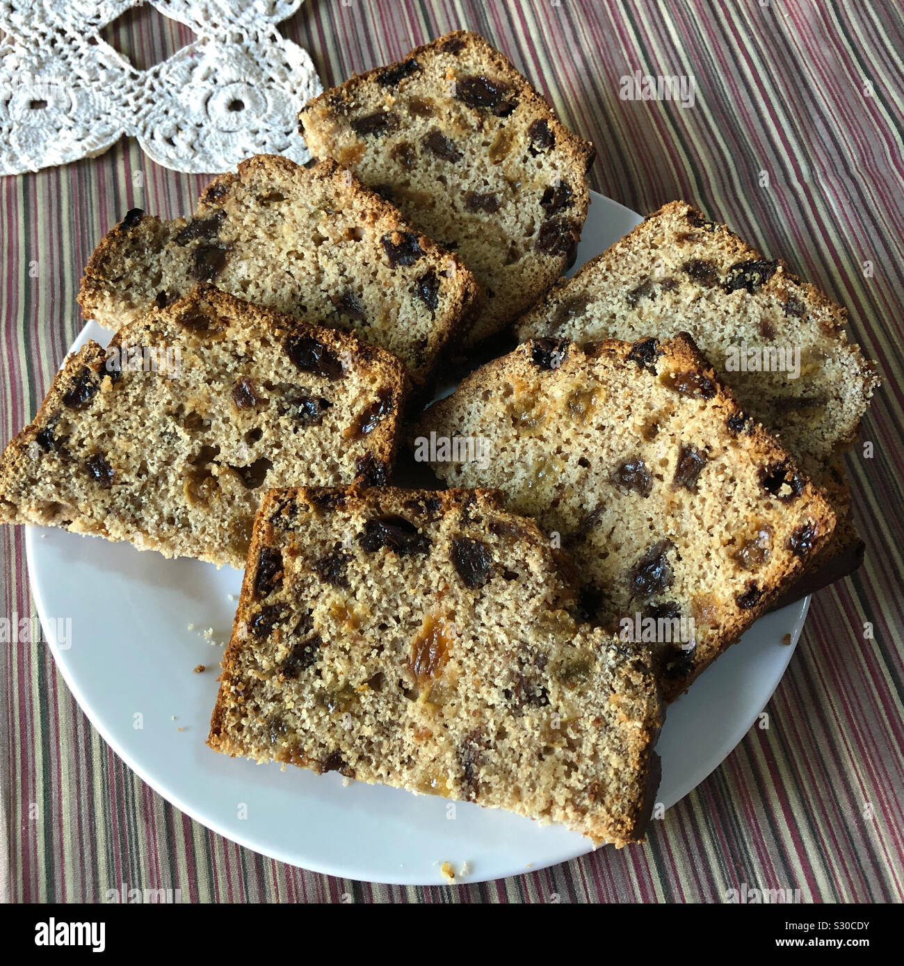 Homemade Welsh bara brith (speckled bread) on a white plate Stock Photo ...
