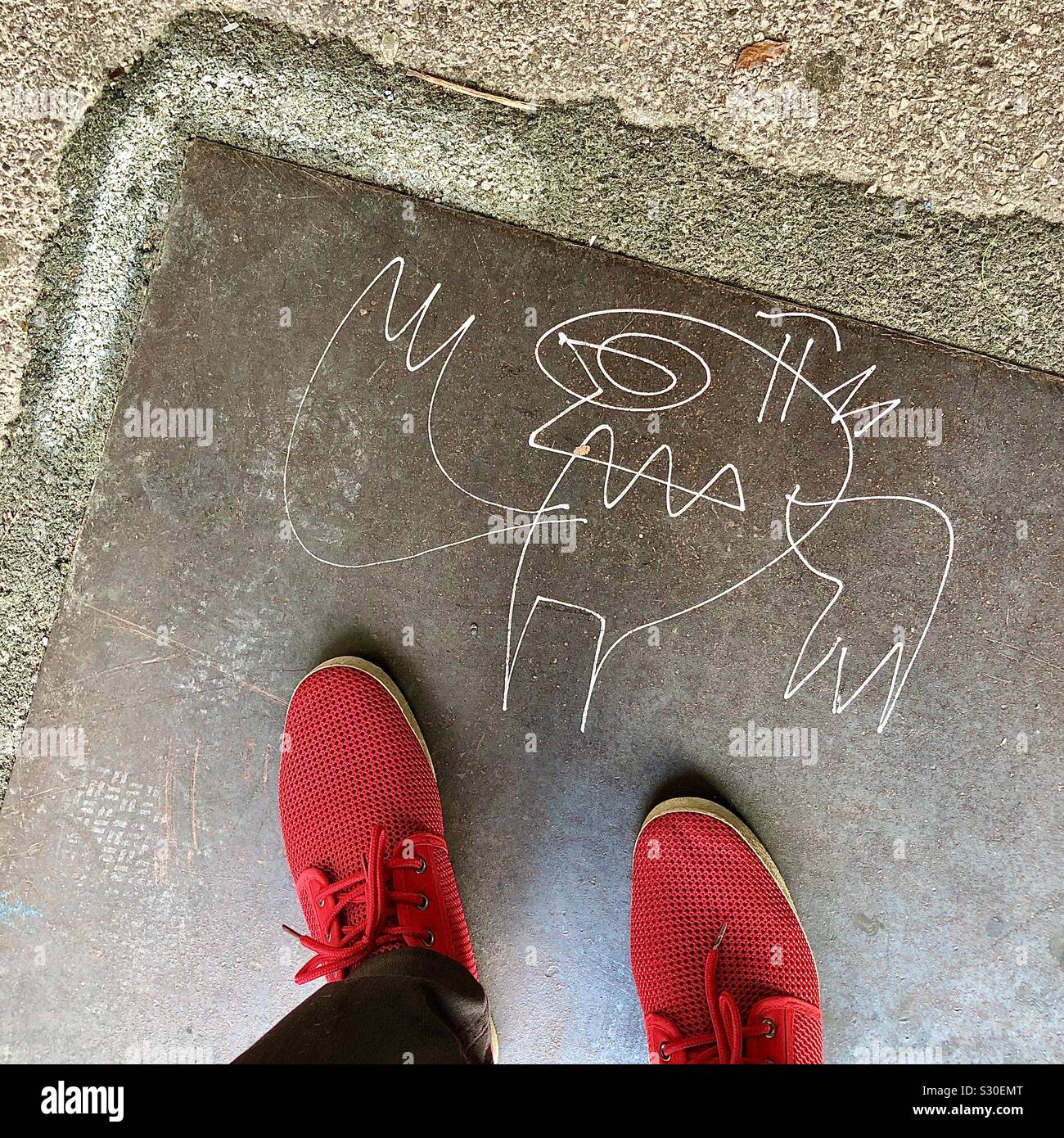Pavement graffiti and red shoes, Vienna, Austria Stock Photo - Alamy