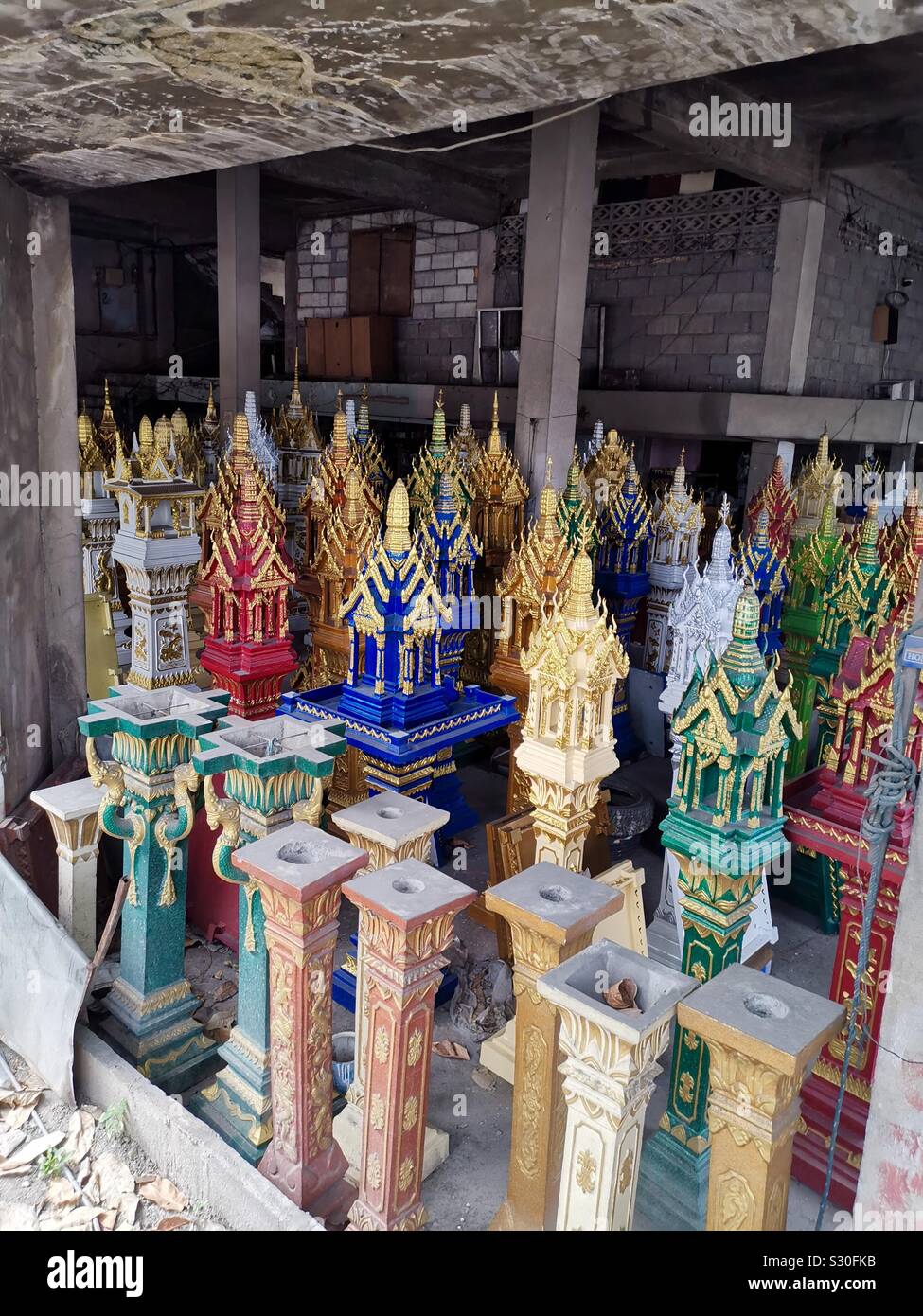 Thai Buddhist temple stands in a local craftsman studio in Chiang Mai ...