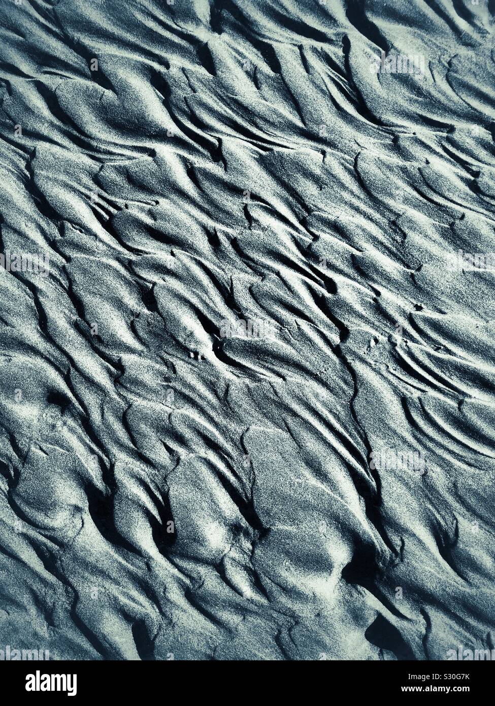 Waves patterns on sand in Tofino, BC Stock Photo - Alamy