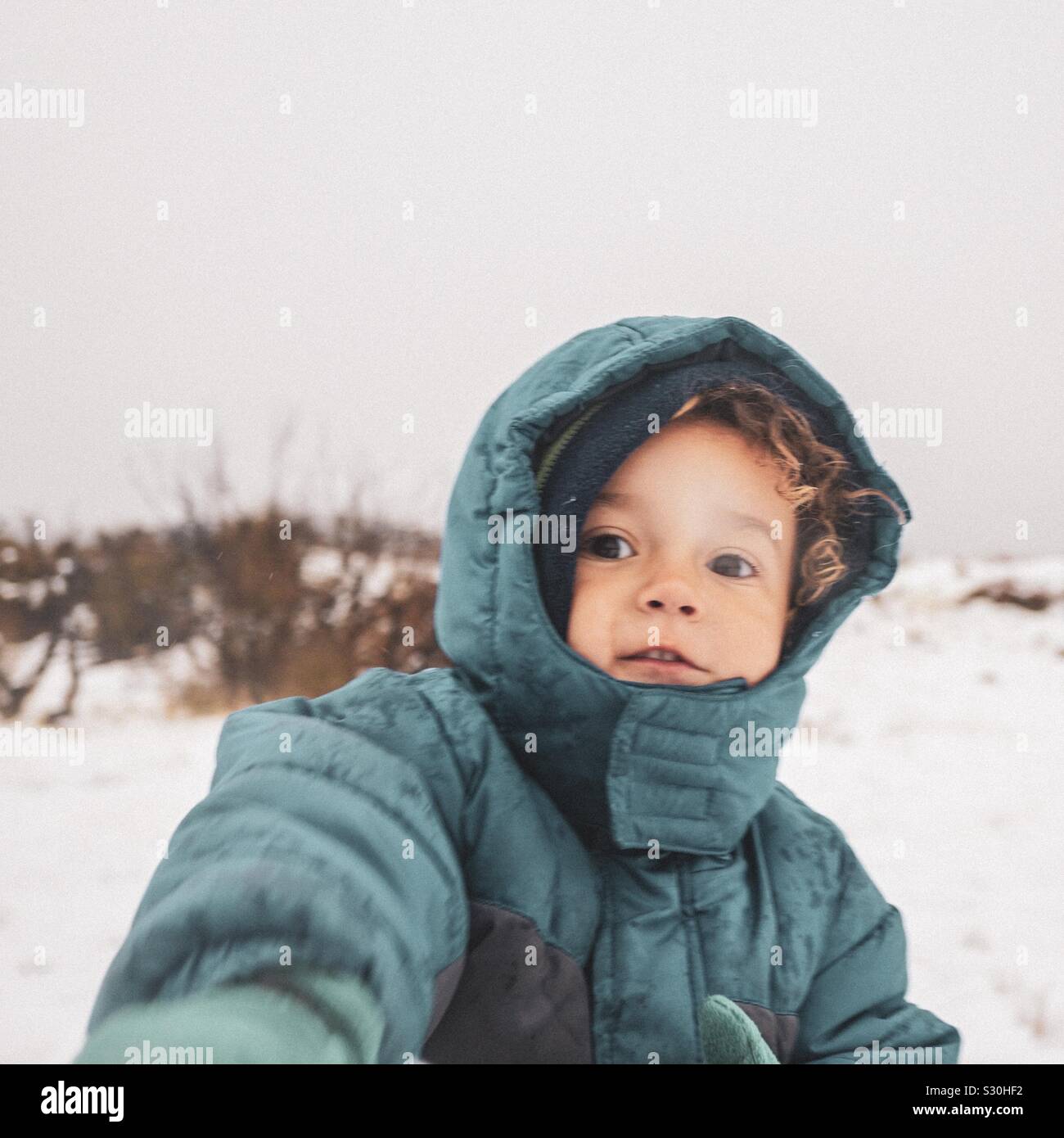 Kid Overdressed For Winter