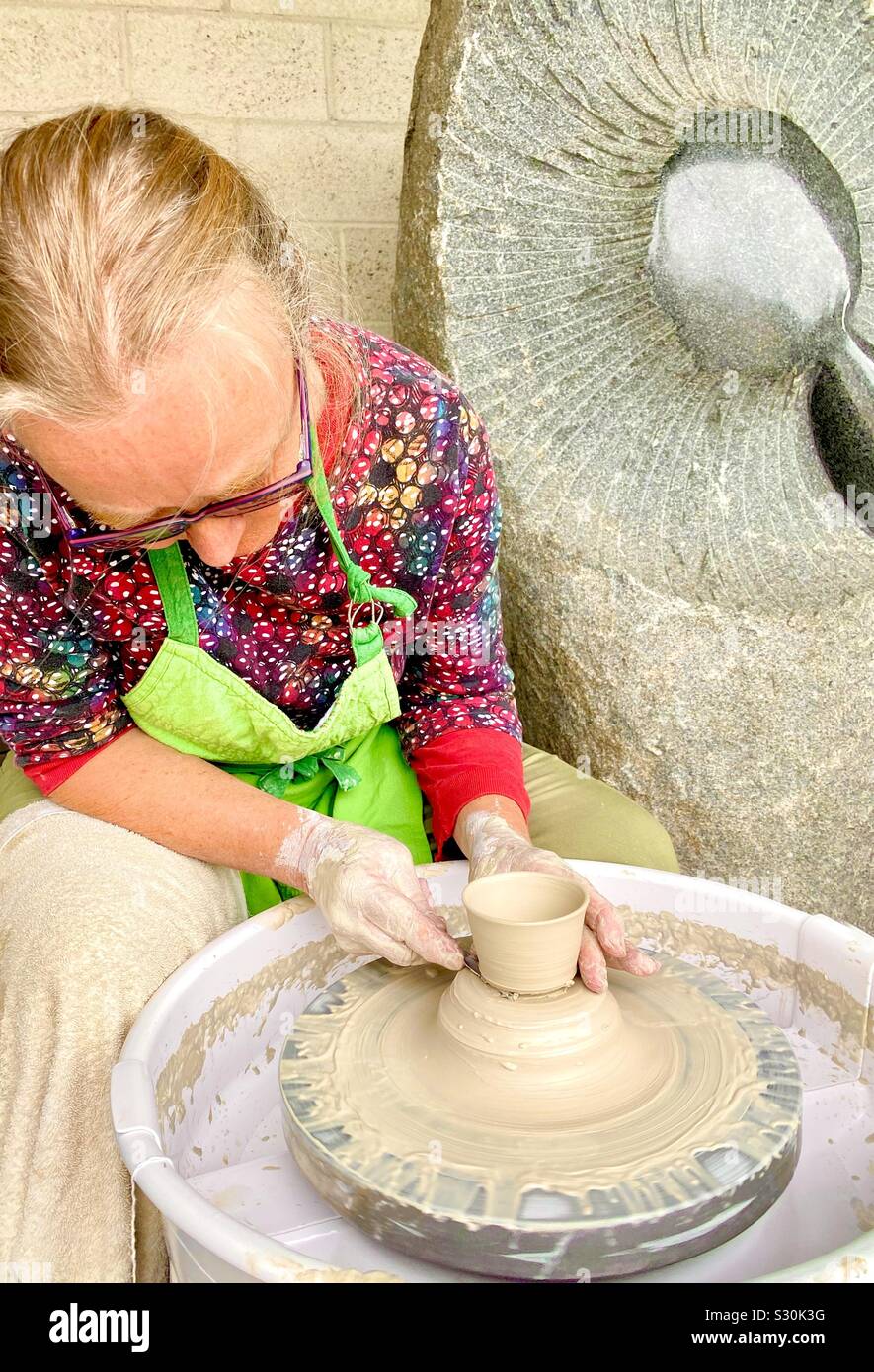 Female Potter at work Stock Photo - Alamy