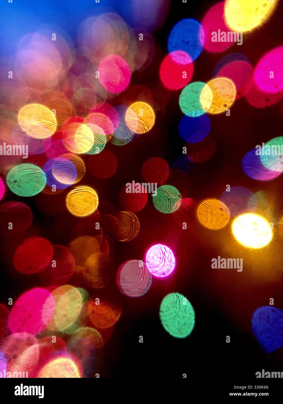 Colorful Christmas light bokeh Stock Photo - Alamy