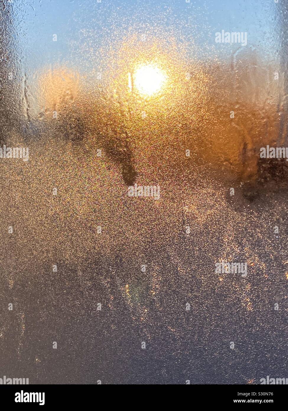 Frosty winter sunrise through window Stock Photo - Alamy