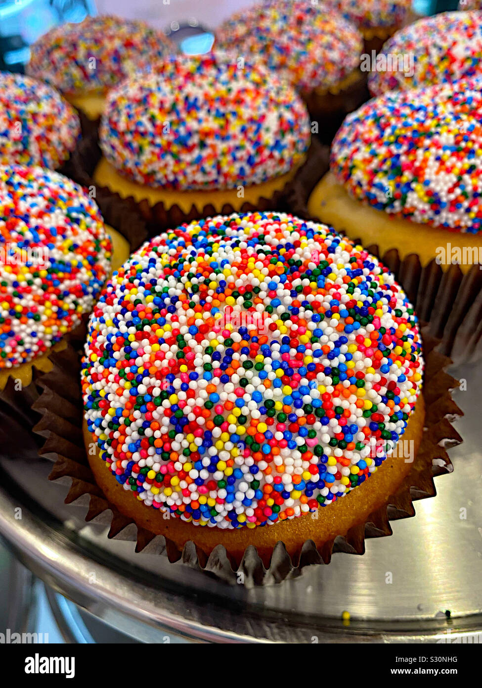 Cupcakes with lots of sprinkles Stock Photo - Alamy