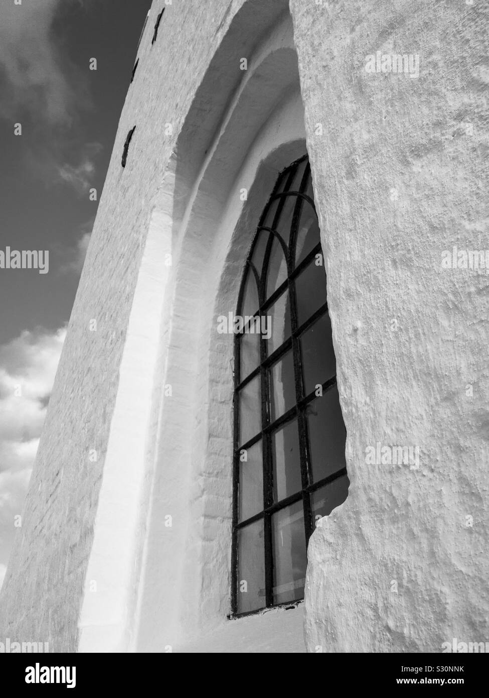 A church window with reflections from the sky Stock Photo - Alamy