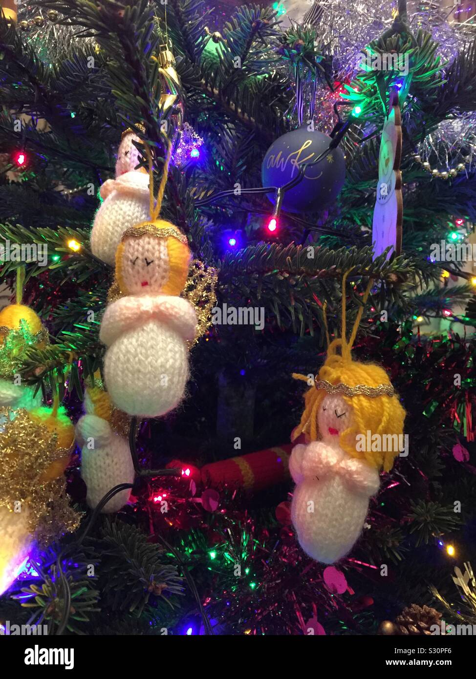 Knitted angels Xmas tree Stock Photo - Alamy