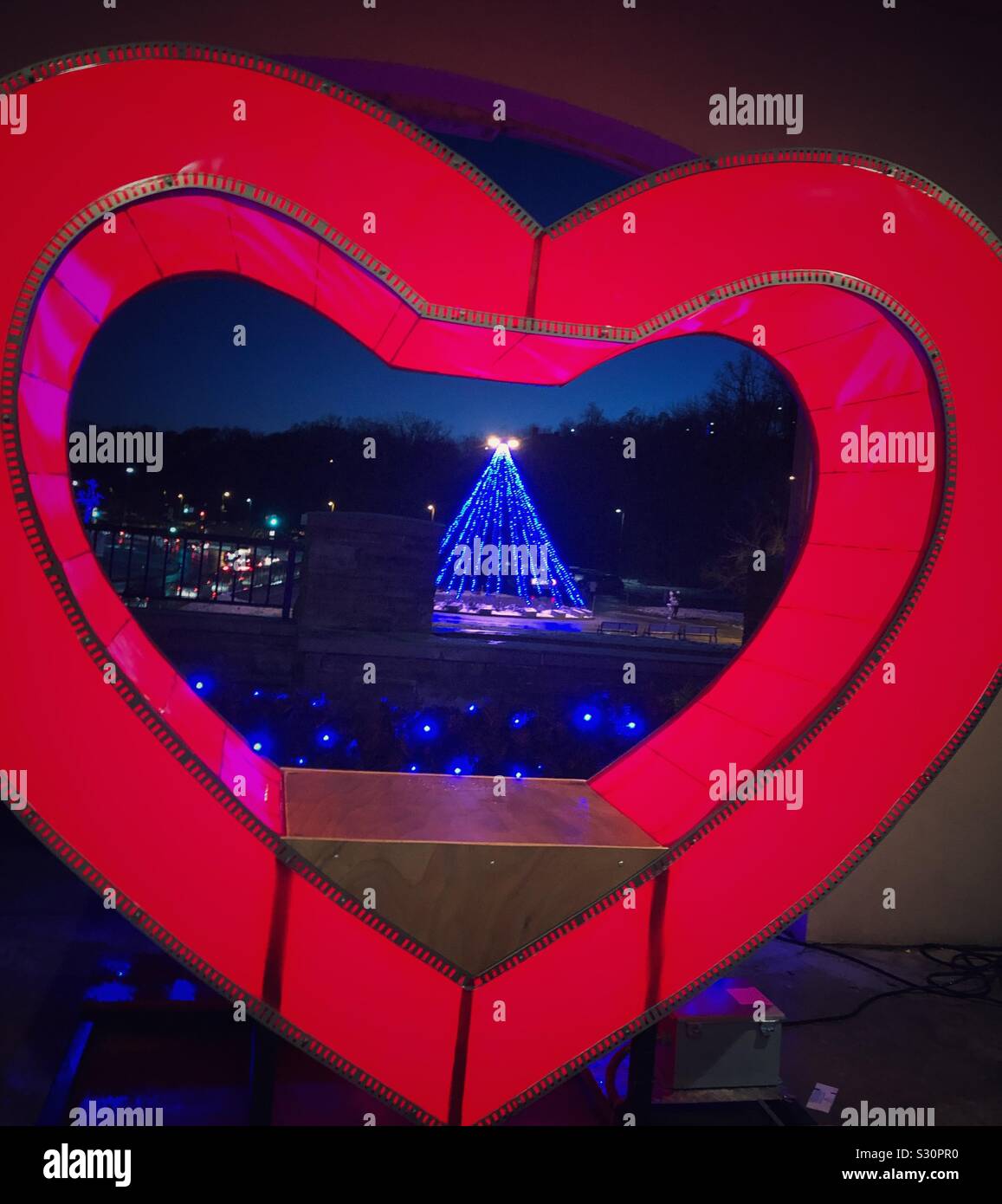 Christmas heart frames in a blue light tree Stock Photo - Alamy