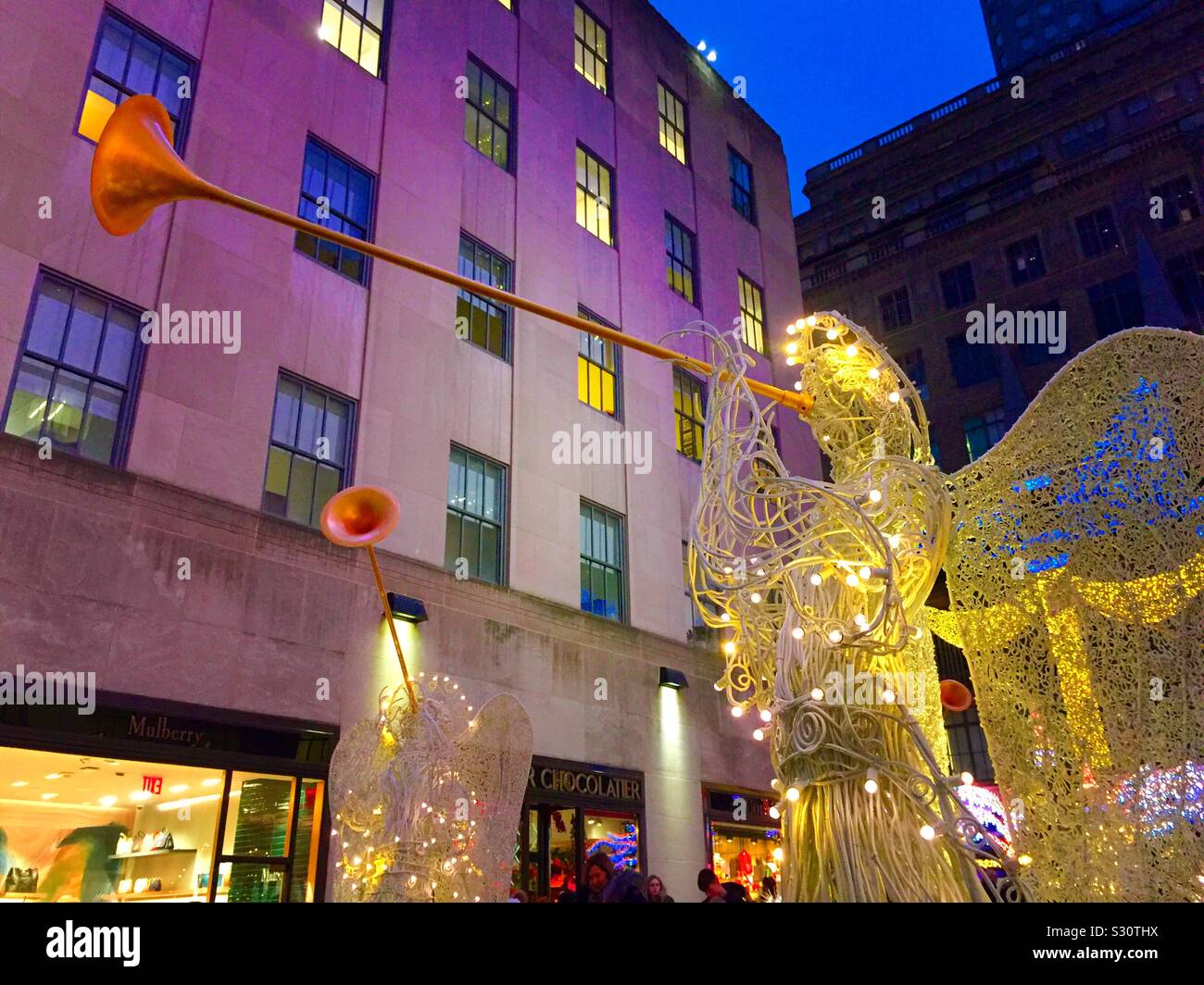 The iconic angels our featured in the channel gardens at Rockefeller ...