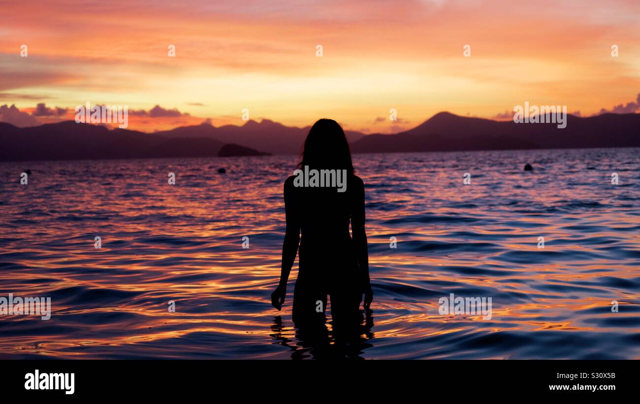 Model and sunset hi-res stock photography and images - Alamy