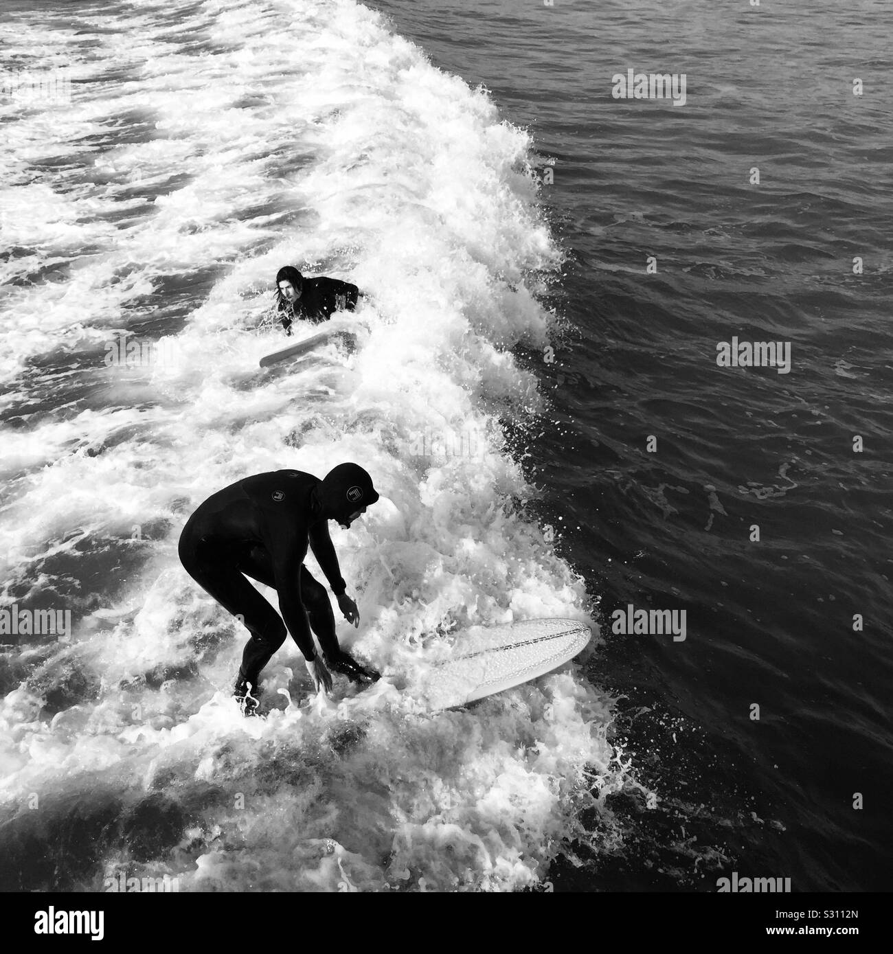 Surfing swimming hi-res stock photography and images - Alamy